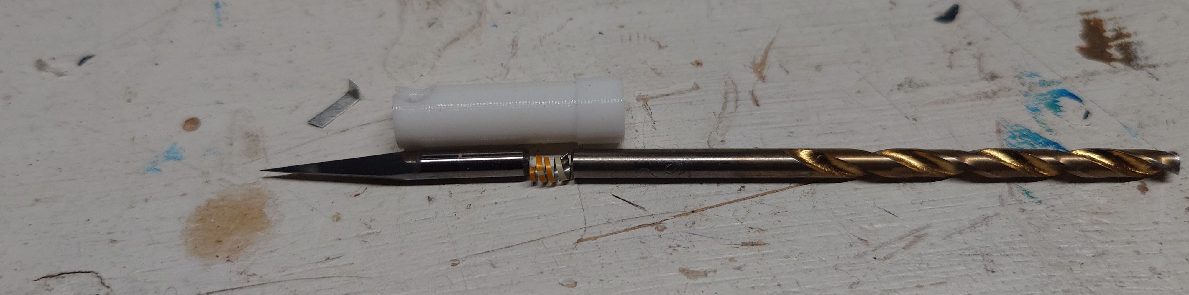 Spring loaded V-bit tool prototype | Details | Hackaday.io