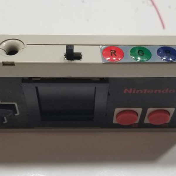 Tiny arcade stuffed in an NES controller. | Hackaday.io